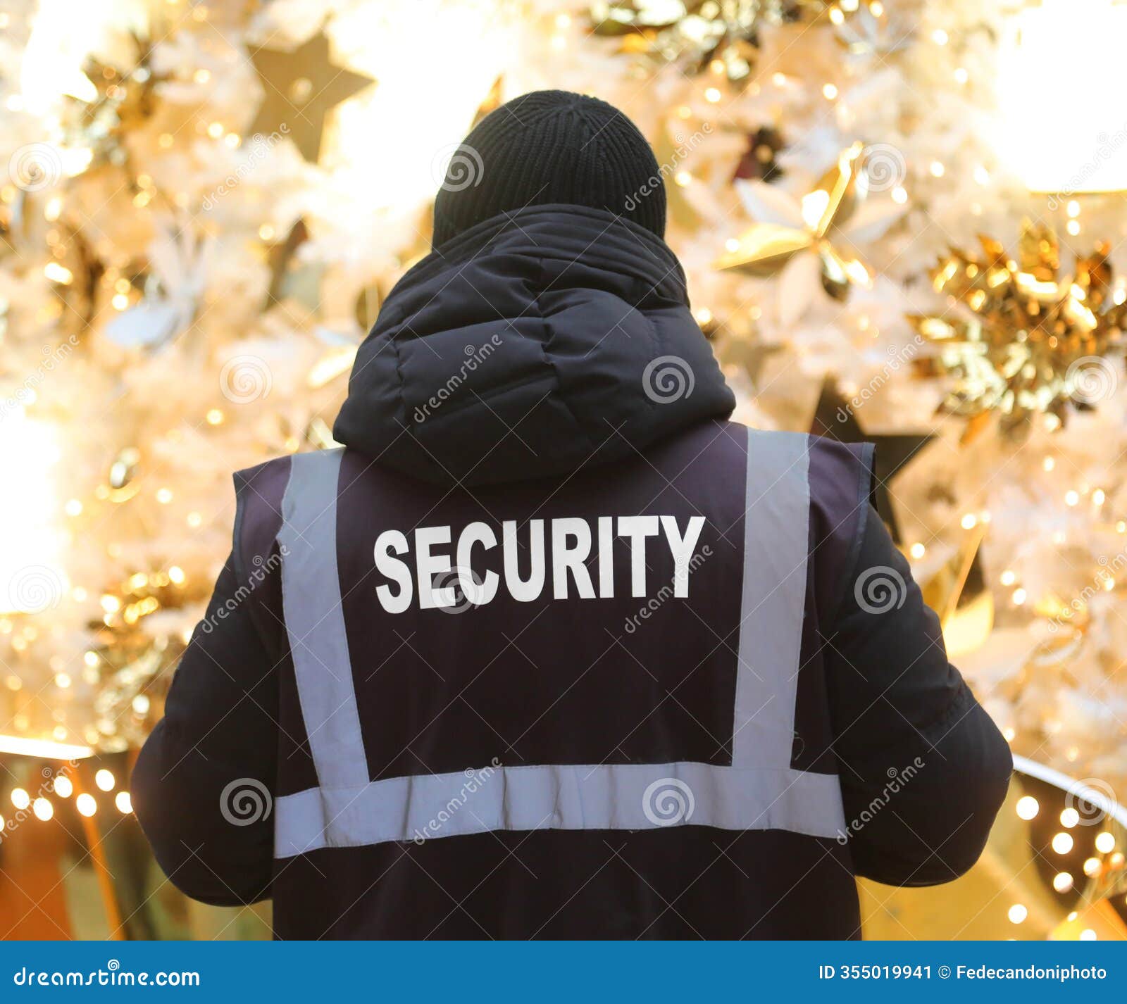 Security Guard on Duty in a Lavishly Decorated Shopping Mall Wearing a ...