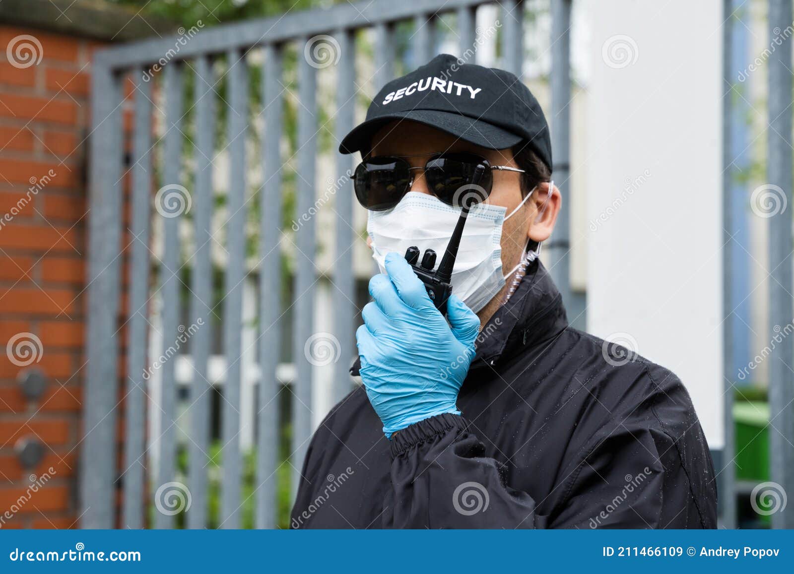 Security Guard in Face Mask Stock Image - Image of chatting, security ...