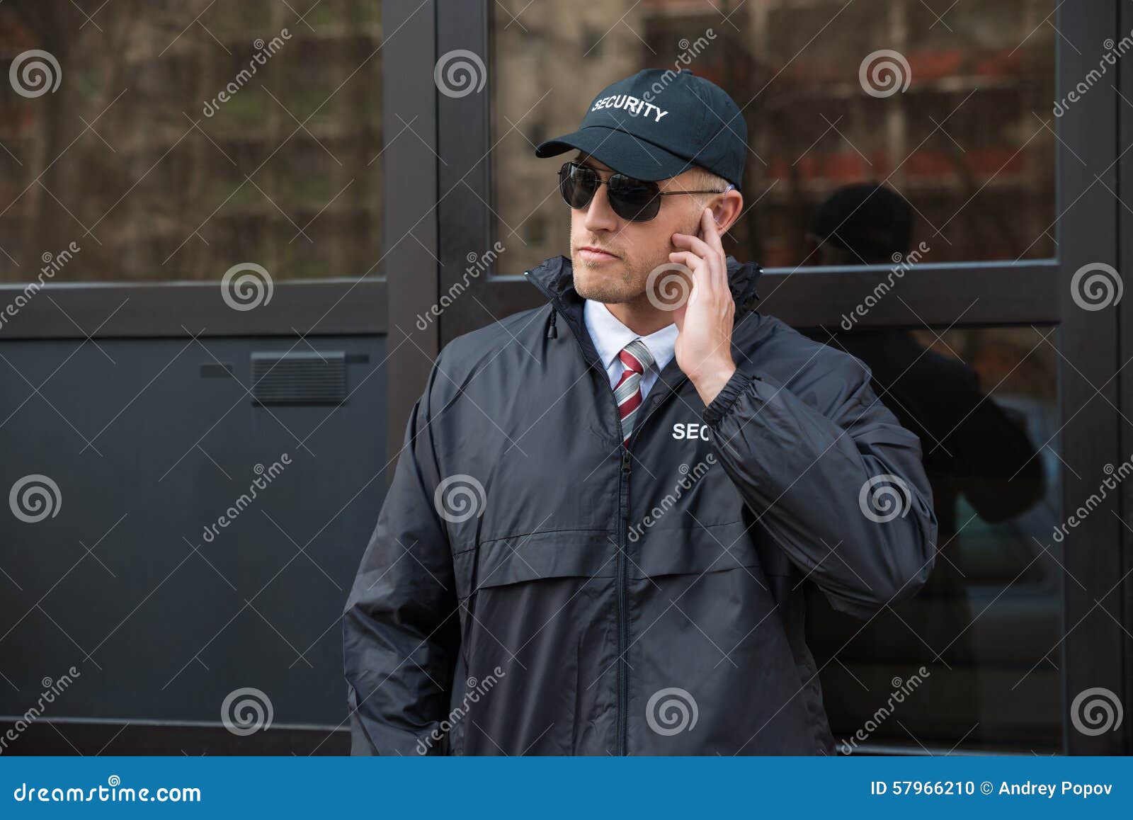 Security Guard in Front of the Door Entrance Stock Photo - Image of ...