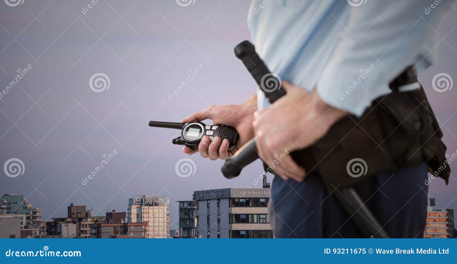 Security Guard Lower Body Against Buildings and Purple Sky Stock Image ...
