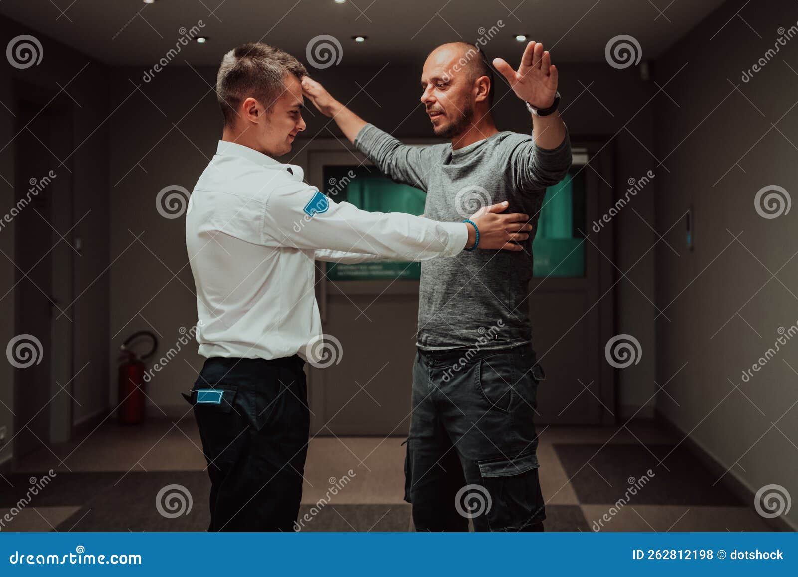 Security Guard Making Body Searching Procedure on Man for Finding ...