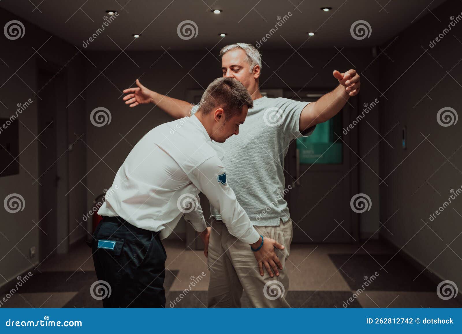 Security Guard Making Body Searching Procedure on Man for Finding ...