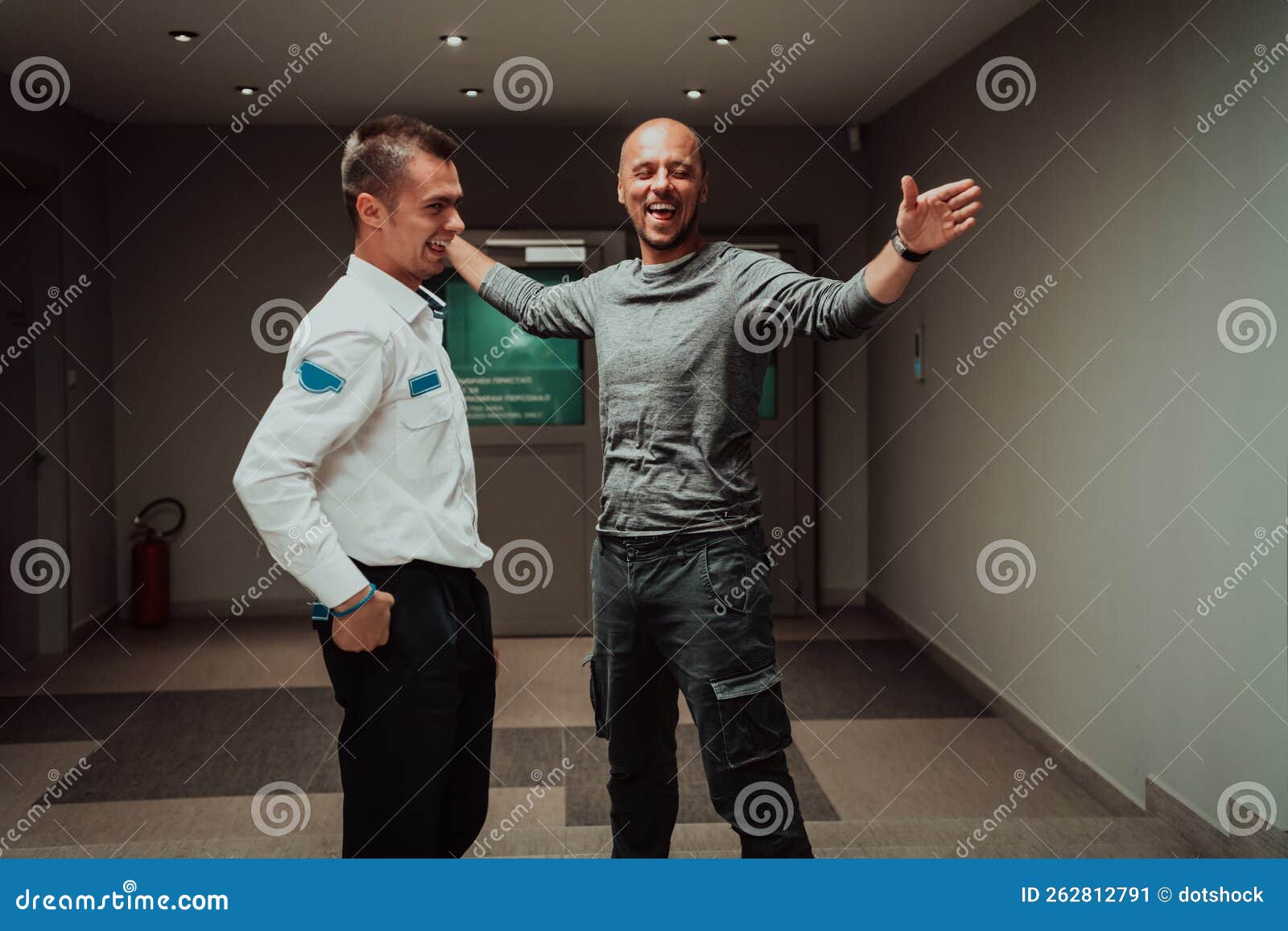 Security Guard Making Body Searching Procedure on Man for Finding ...