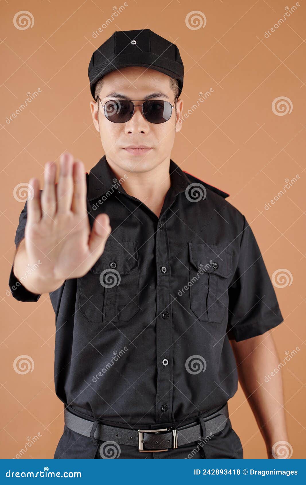 Security Guard Making Stop Gesture Stock Photo - Image of studio ...