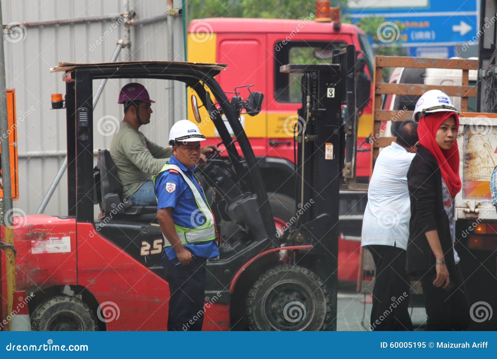 Security Guard in the Midst of Construction Workers Editorial Image ...