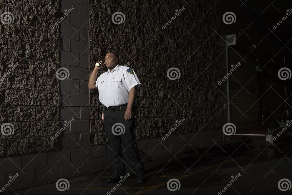 Security Guard Patrols at Night with Torch Stock Photo - Image of ...
