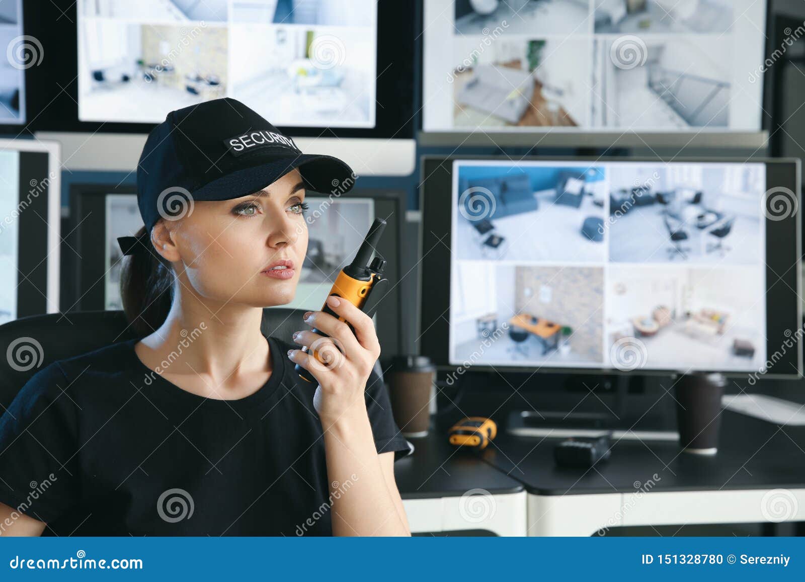 Security Guard with Portable Radio Transmitter in Surveillance Room ...