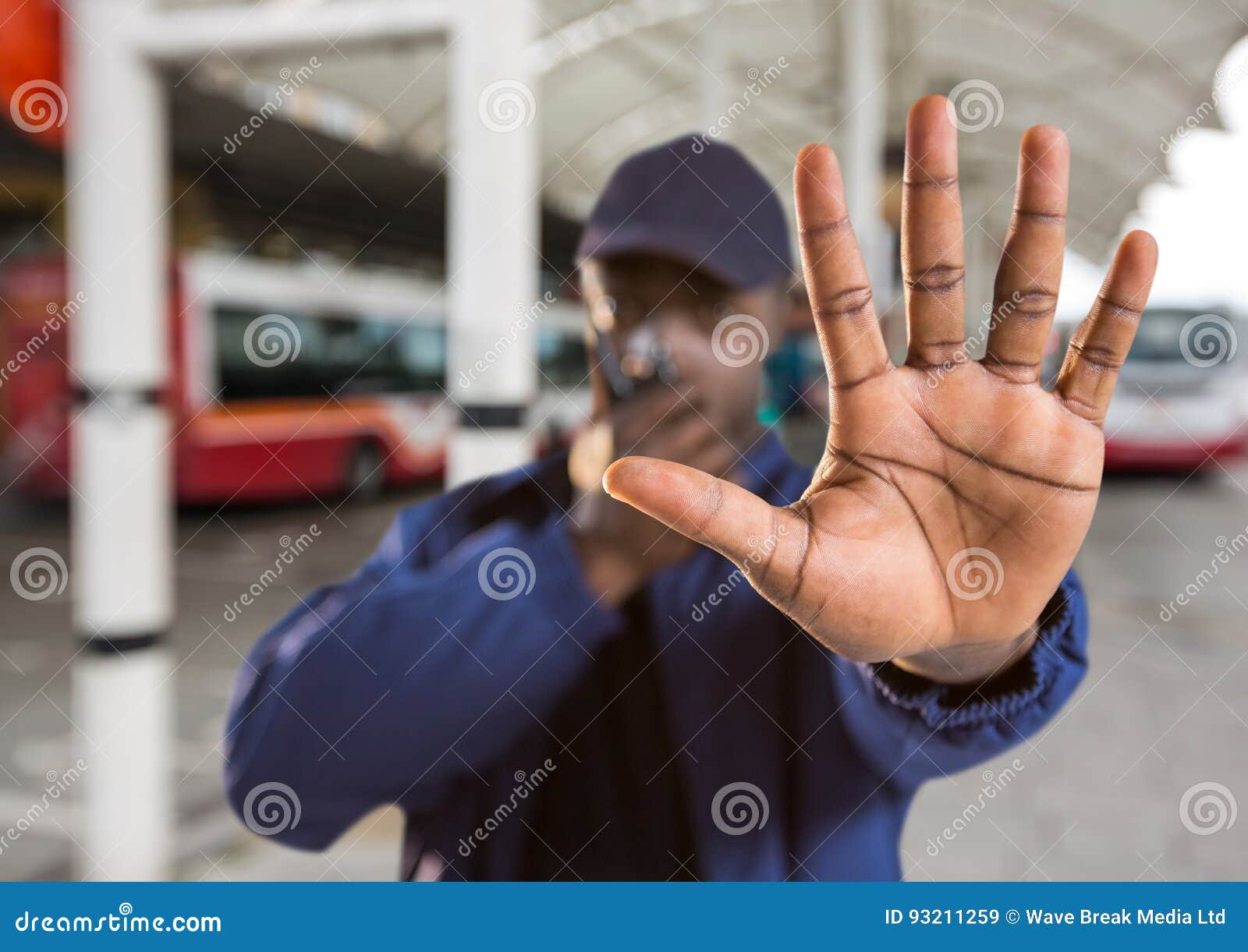 Security Guard Saying Stop with His Hand in the Bus Station Stock Image ...