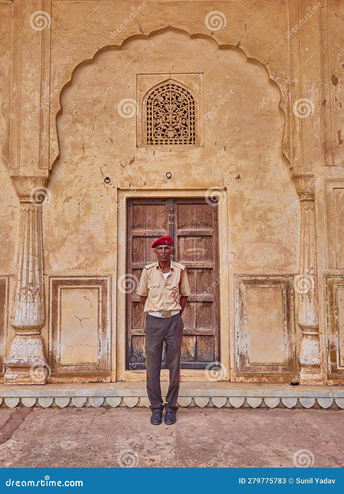 A Security Guard is Standing Behind a Gate of Fort Editorial Stock ...