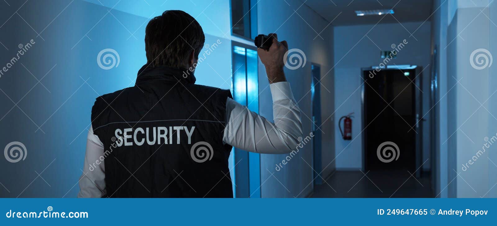 Security Guard Standing in Corridor of the Building Stock Image - Image ...