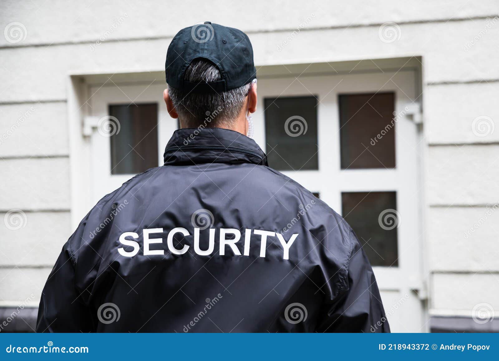Security Guard Standing Outside Building Stock Photo - Image of ...