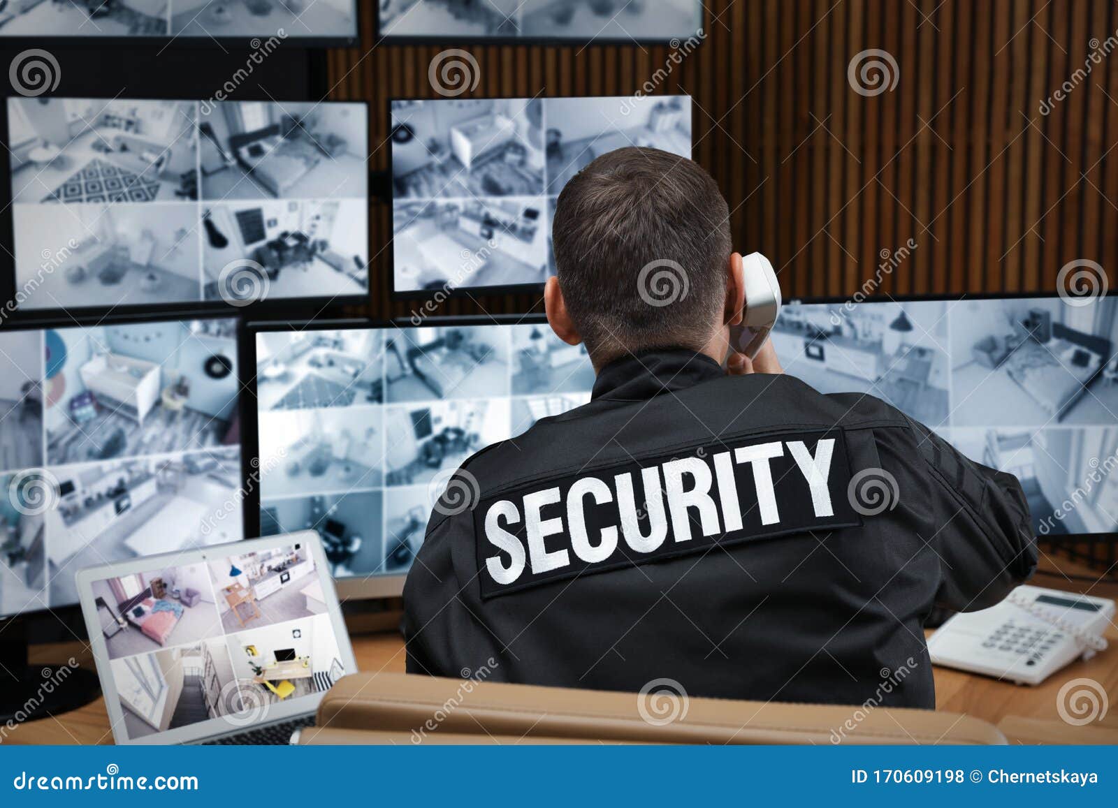 Security Guard Talking on Telephone Stock Photo - Image of male, office ...