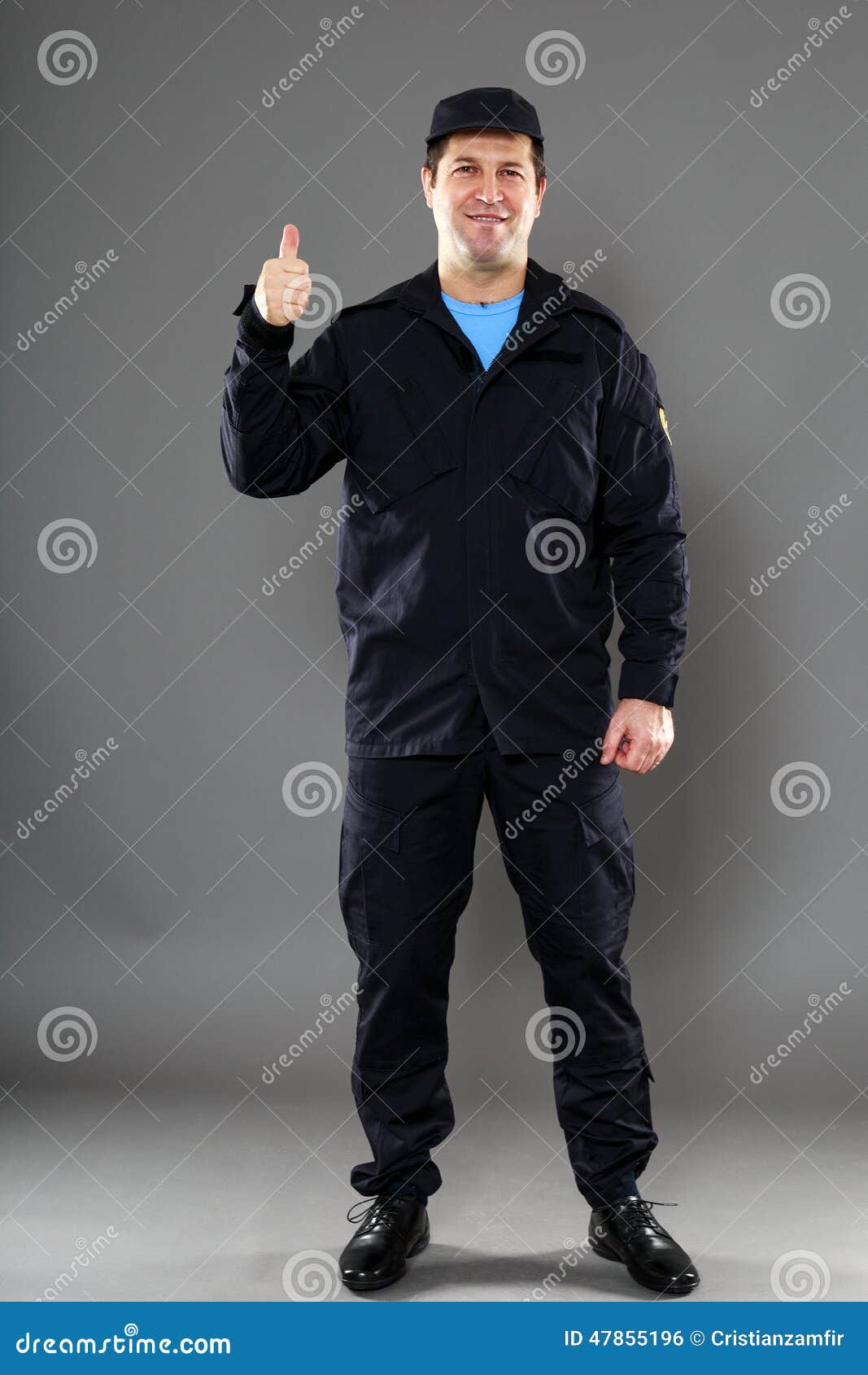 A Security Guard with a Thumb Up Sign Stock Photo - Image of success ...