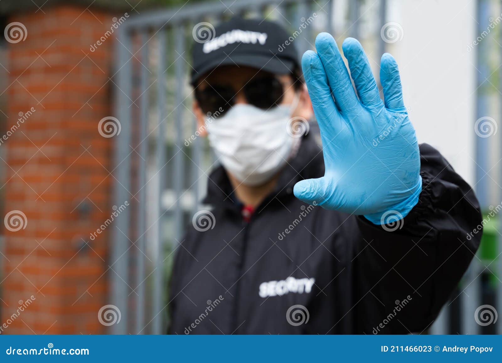 Security Guard in Face Mask Making Stop Hand Gesture Stock Image ...
