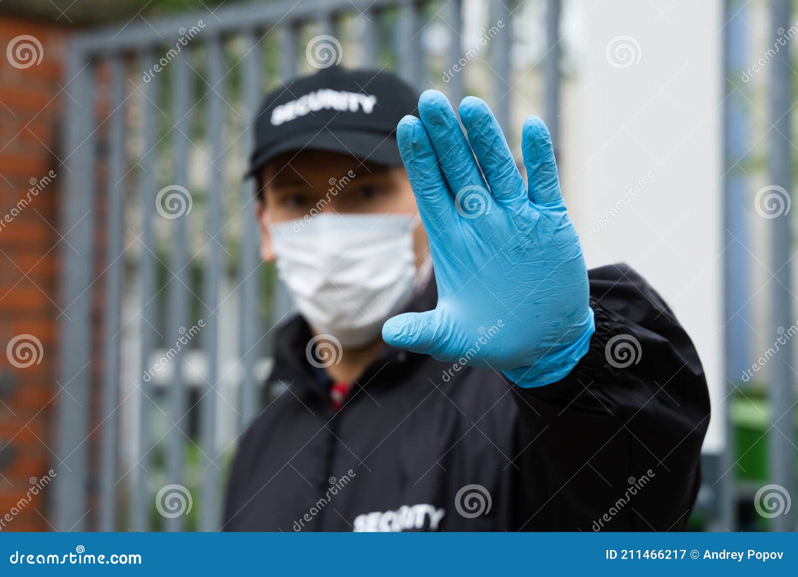 Security Guard in Face Mask Making Stop Hand Gesture Stock Image ...