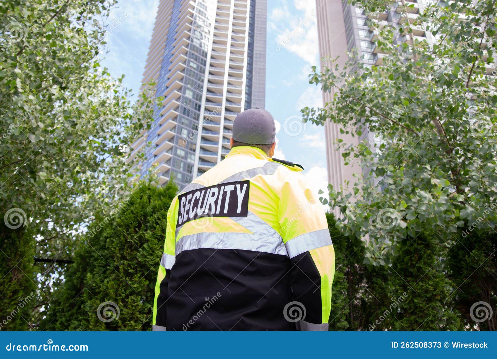 Security Guard in Uniform Patrolling a Residential Area. Stock Image ...