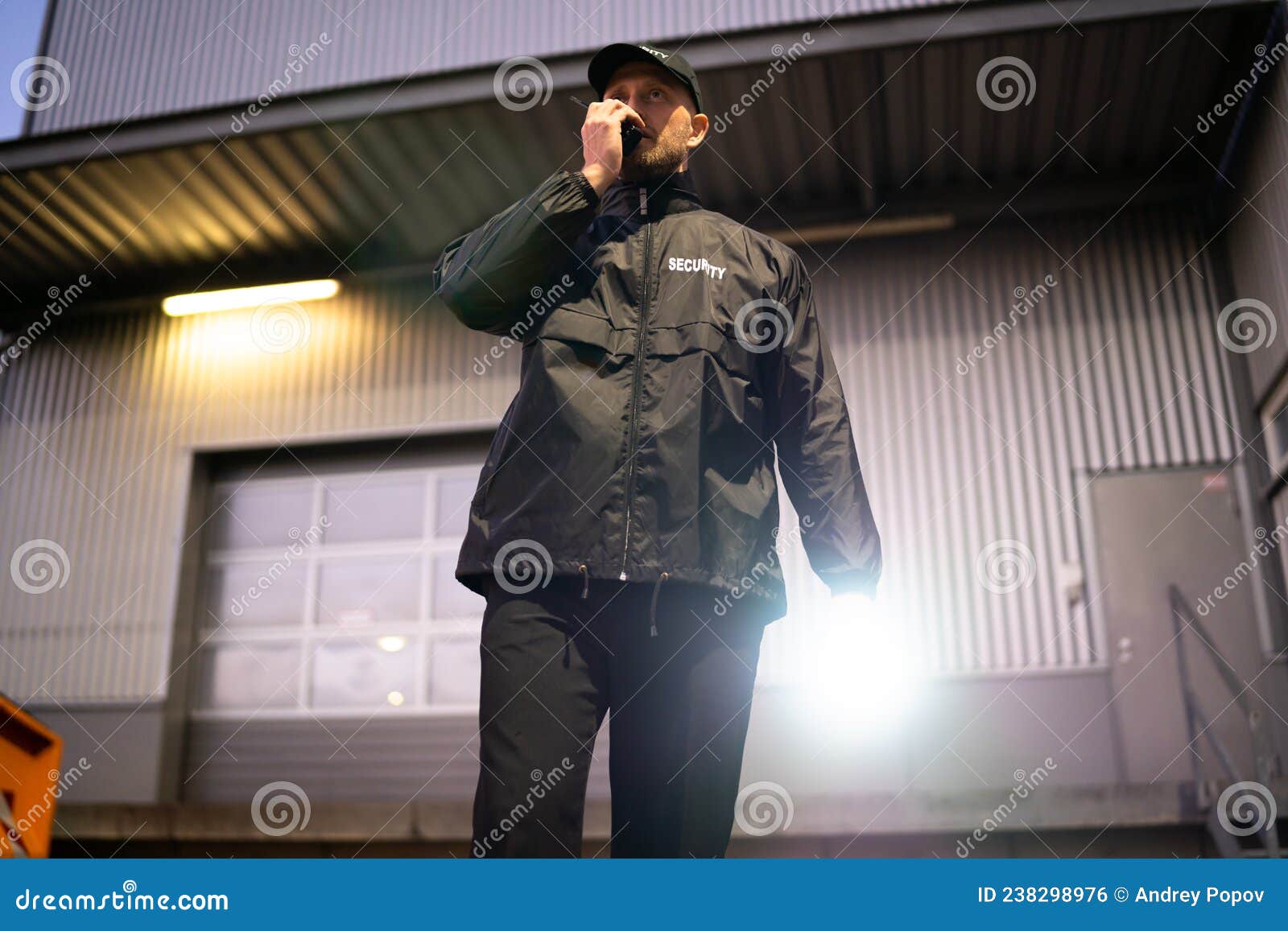 Security Guard Walking Building Perimeter with Flashlight Stock Photo ...