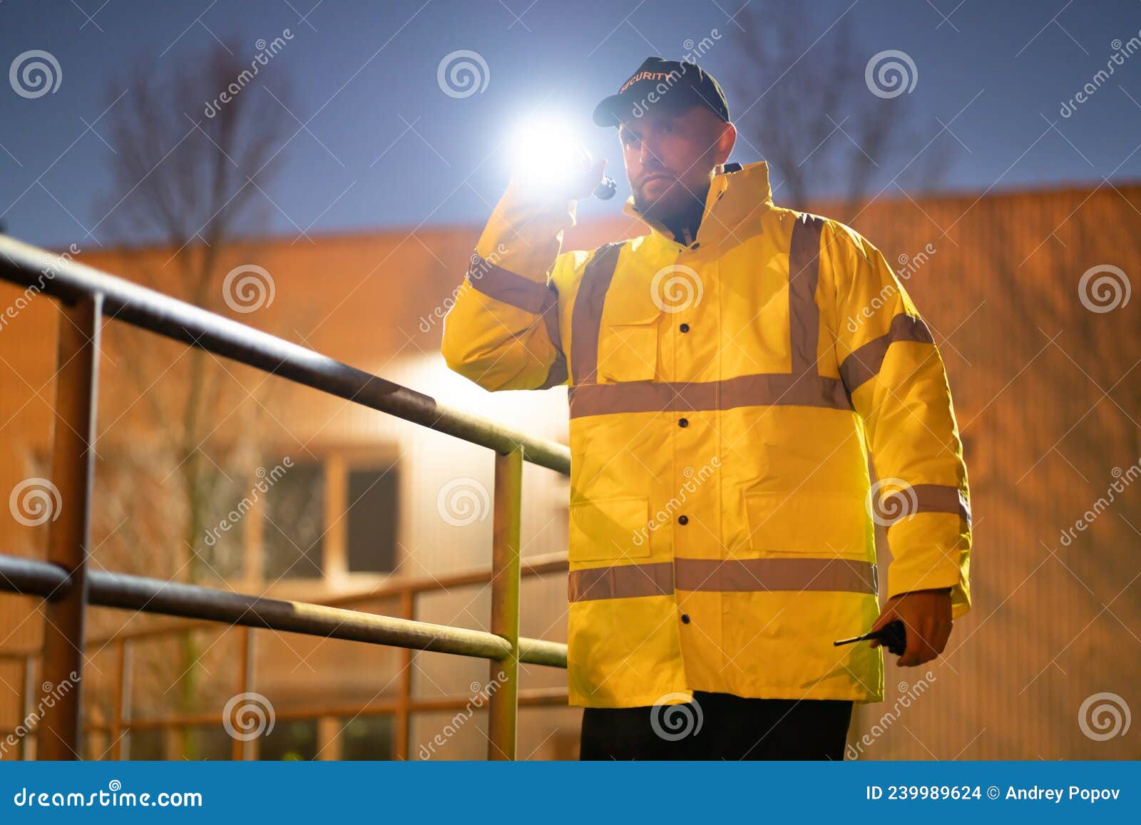 Security Guard Walking Building Perimeter with Flashlight Stock Photo ...