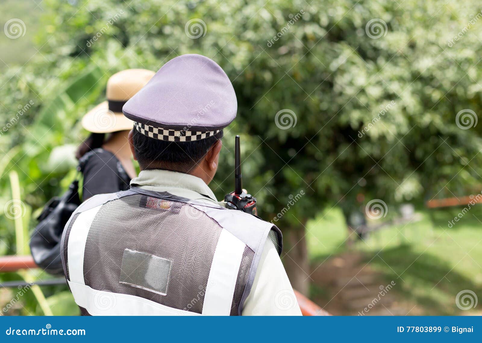 Security Guard Watching for Safty of Tourist Woman Stock Image - Image ...