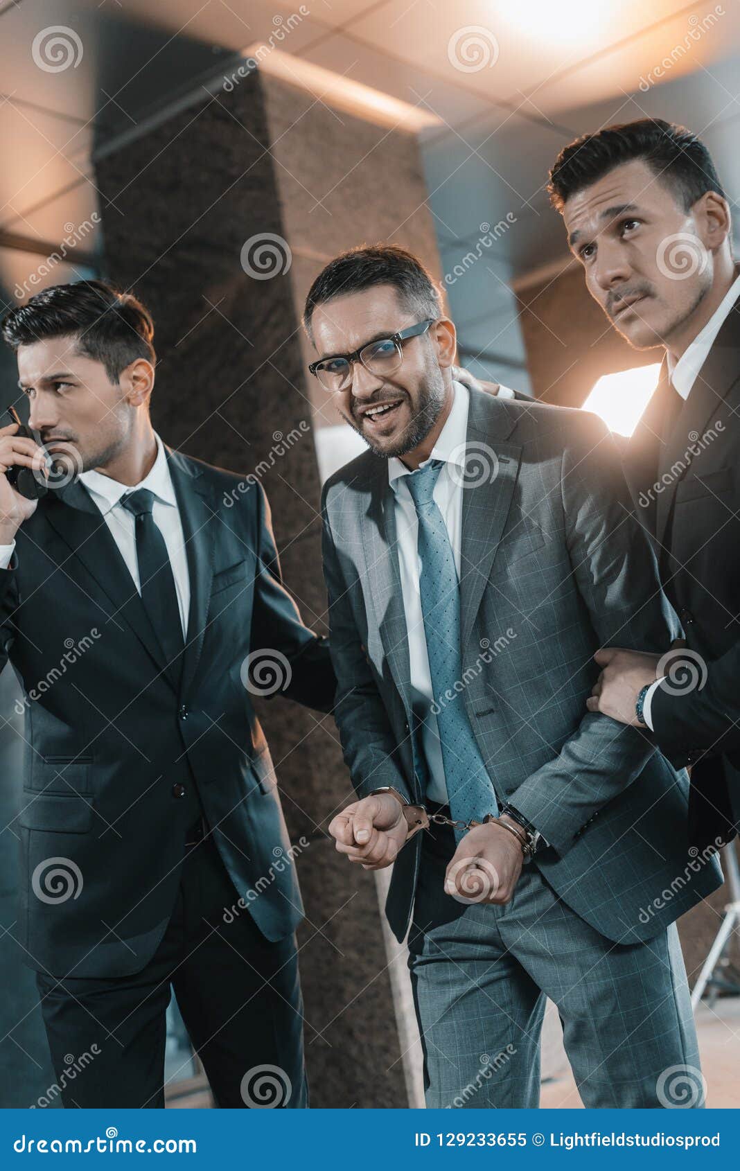 Security Guards Arresting Laughing Stock Image - Image of male ...