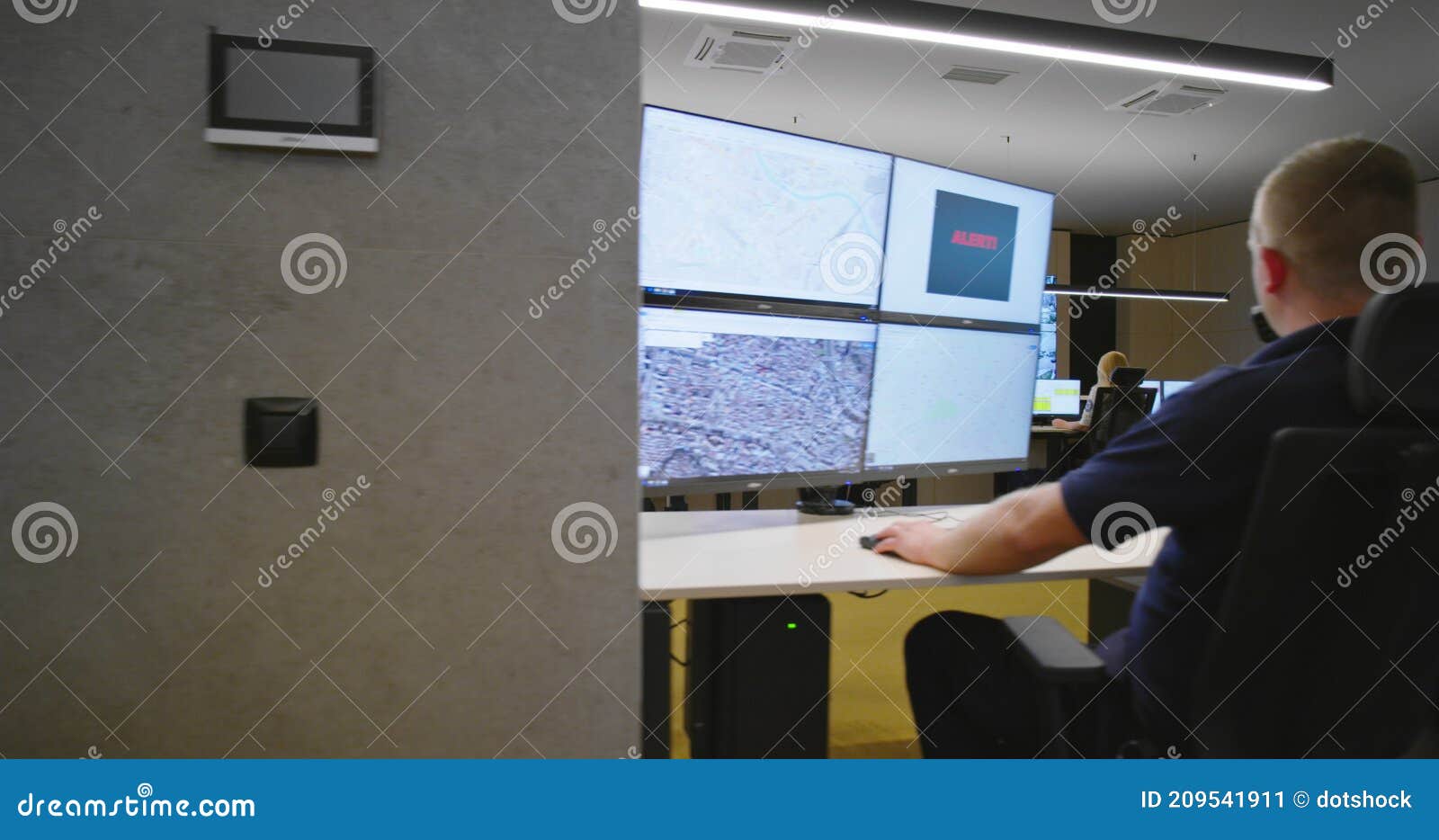 Security Guards Monitoring Modern CCTV Cameras in Surveillance Room ...