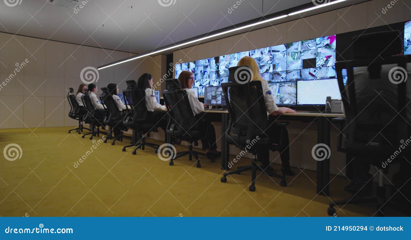 Security Guards Monitoring Modern CCTV Cameras in Surveillance Room ...
