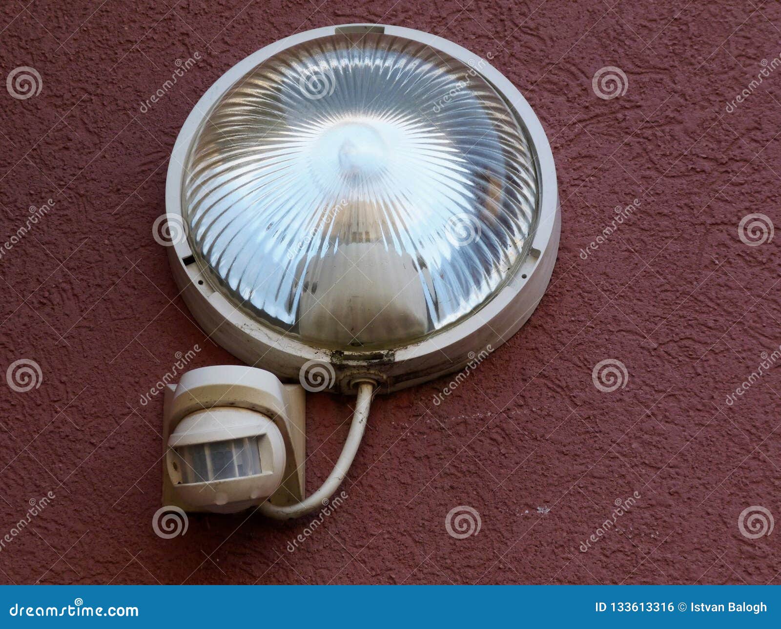 Security Light on Building Facade with Motion Sensor Stock Photo ...