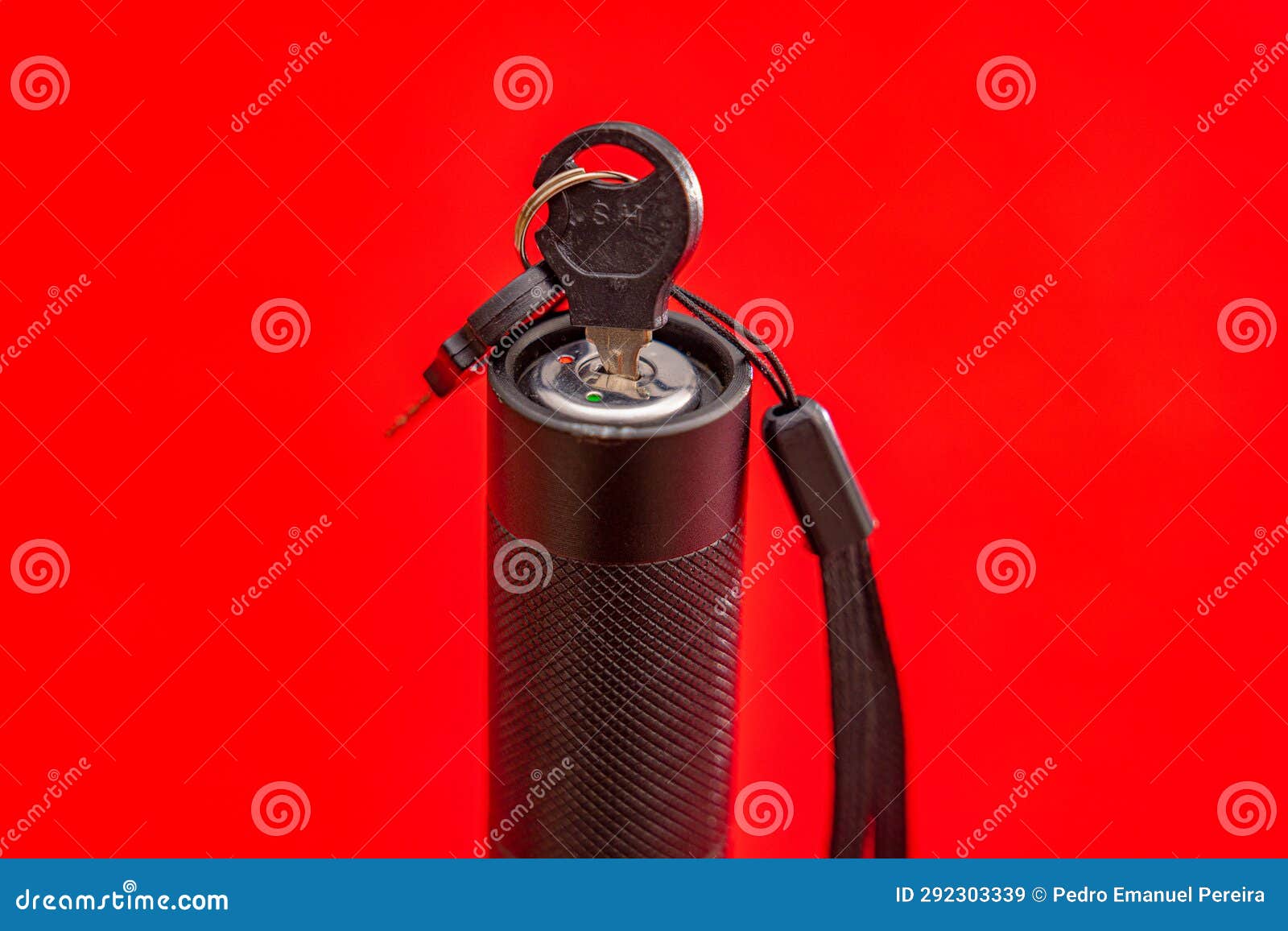 Security Lock on Back of Laser Light Pointer with Key Inserted on ...