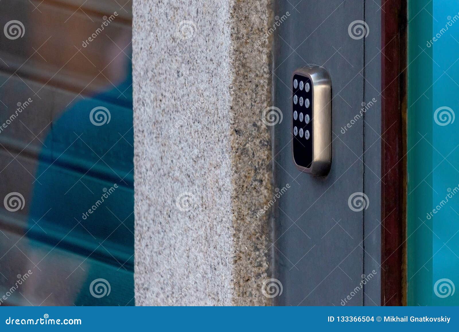 A Security Lock on an Gate with a Touch Panel for Access by an Access ...