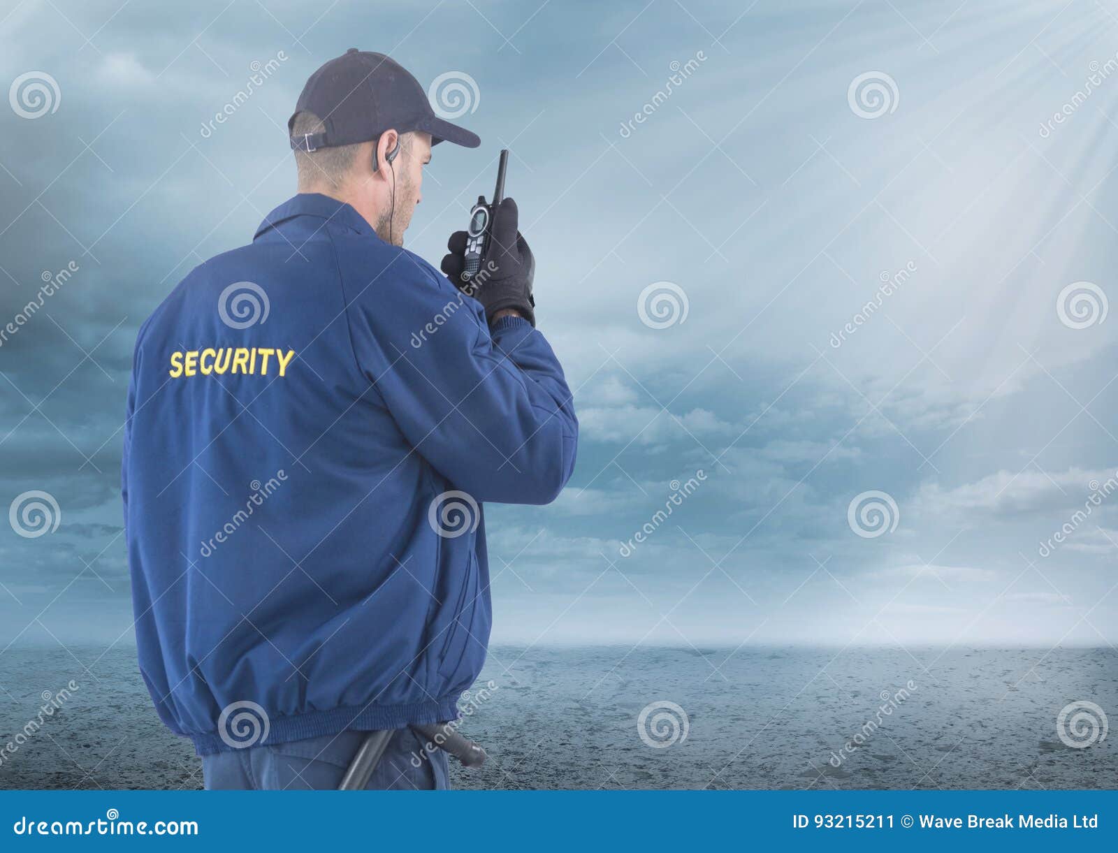 Security Man Outside with Clouds Stock Image - Image of barren, flare ...