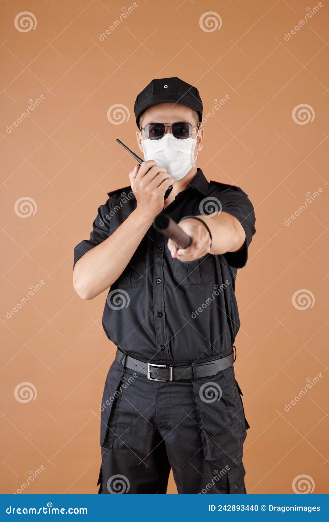 Security Officer Pointing with Baton Stock Photo - Image of power ...