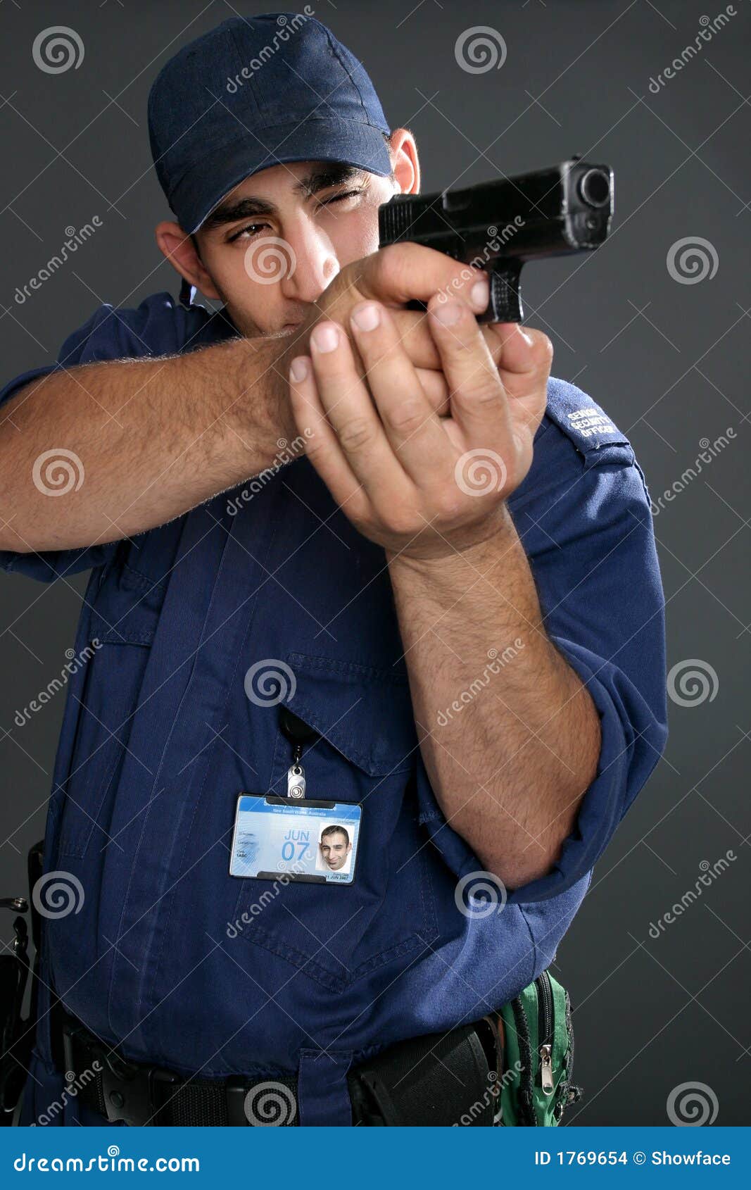 Security Officer takes aim stock photo. Image of officer - 1769654