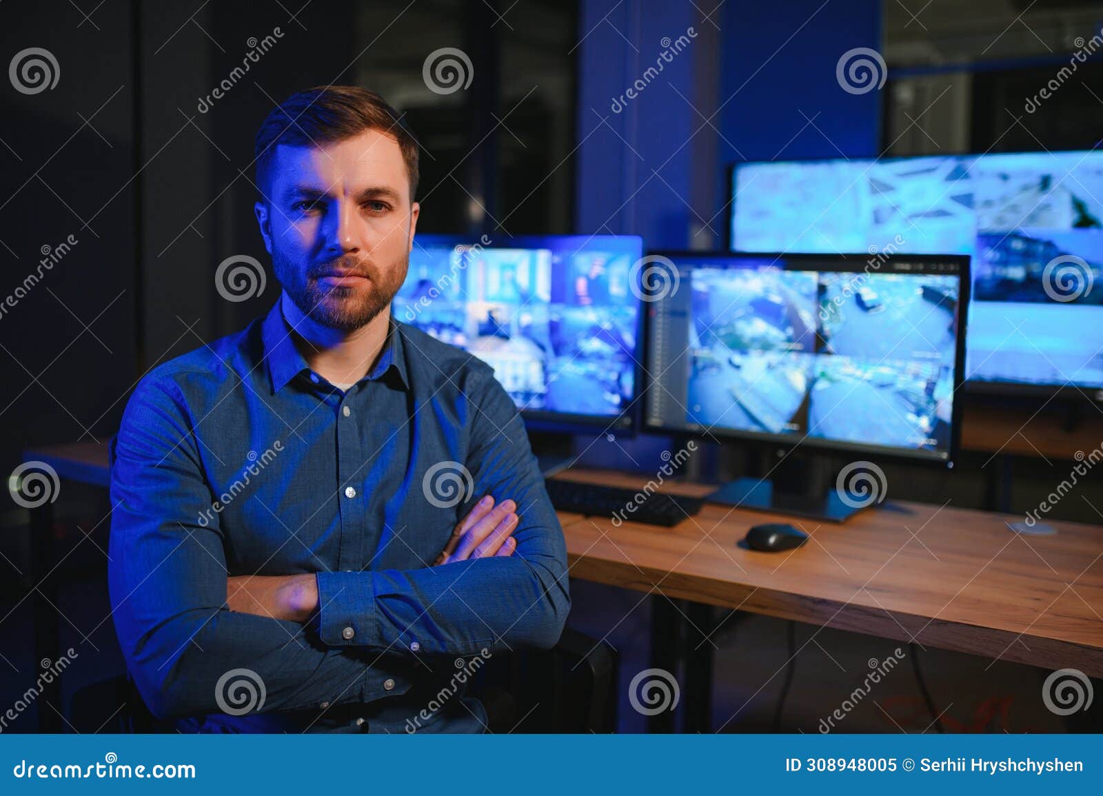 Security Operator Controls CCTV Cameras in Office at Night. Modern ...