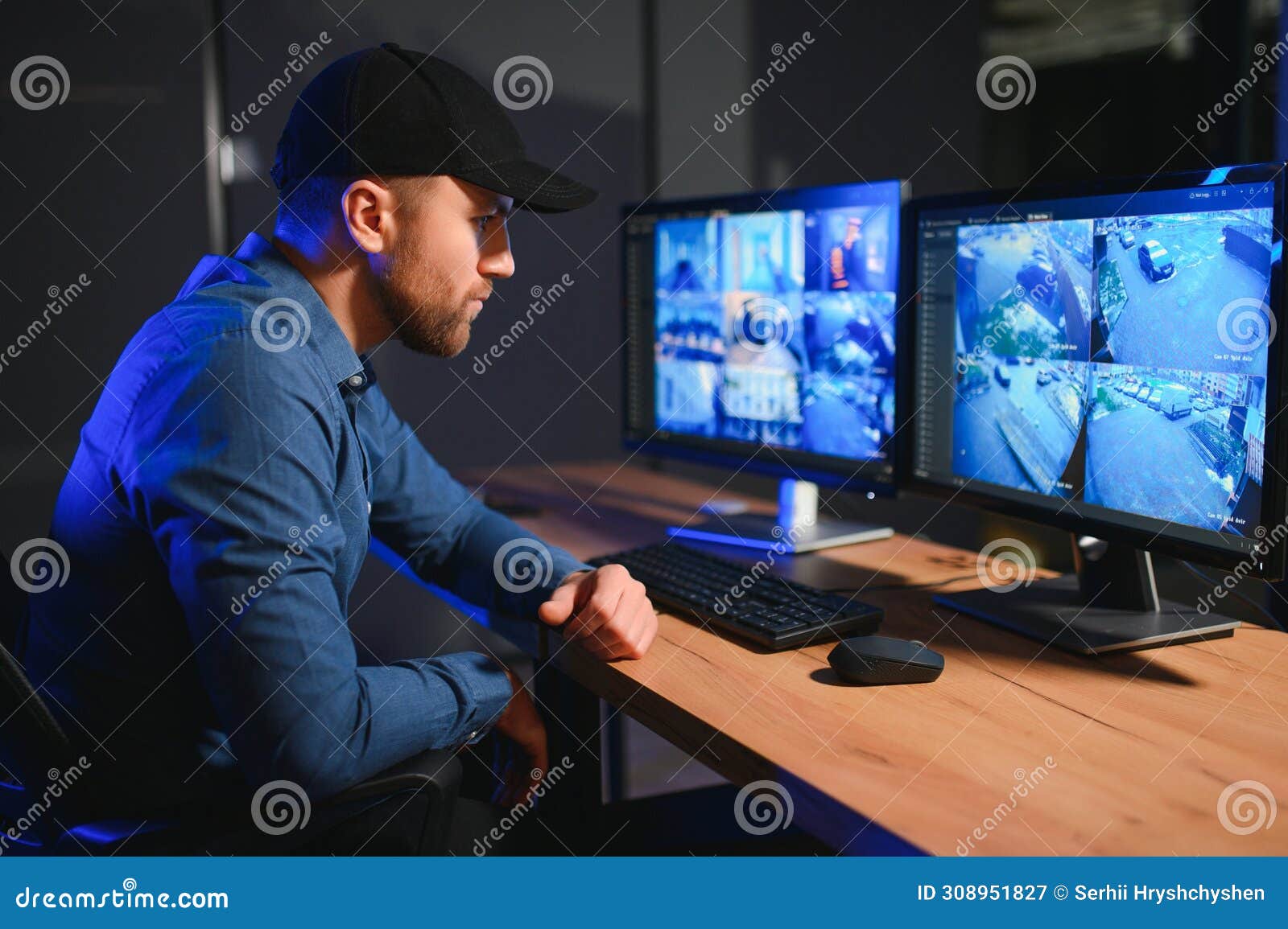 Security Operator Controls CCTV Cameras in Office at Night. Modern ...