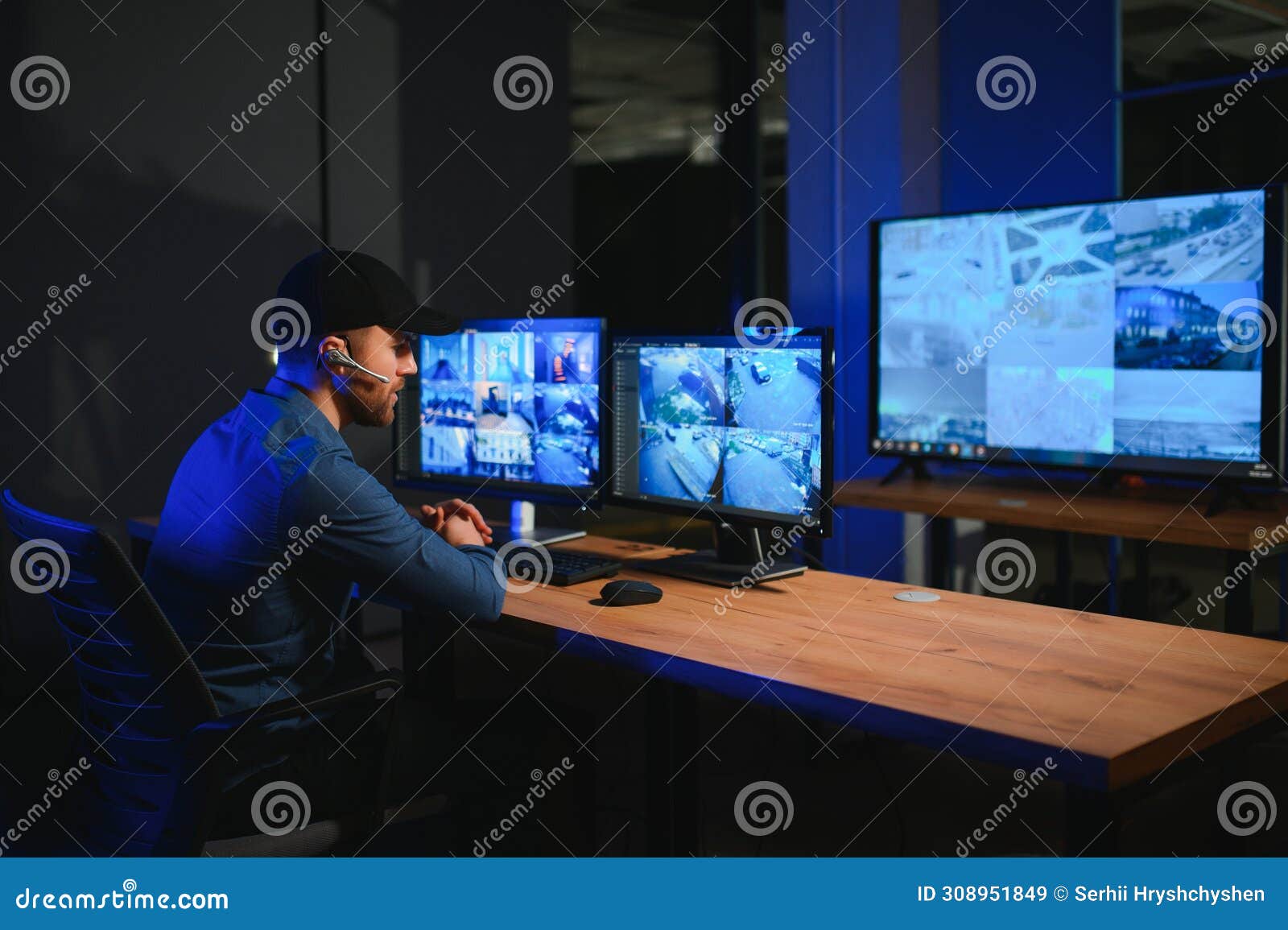 Security Operator Controls CCTV Cameras in Office at Night. Modern ...