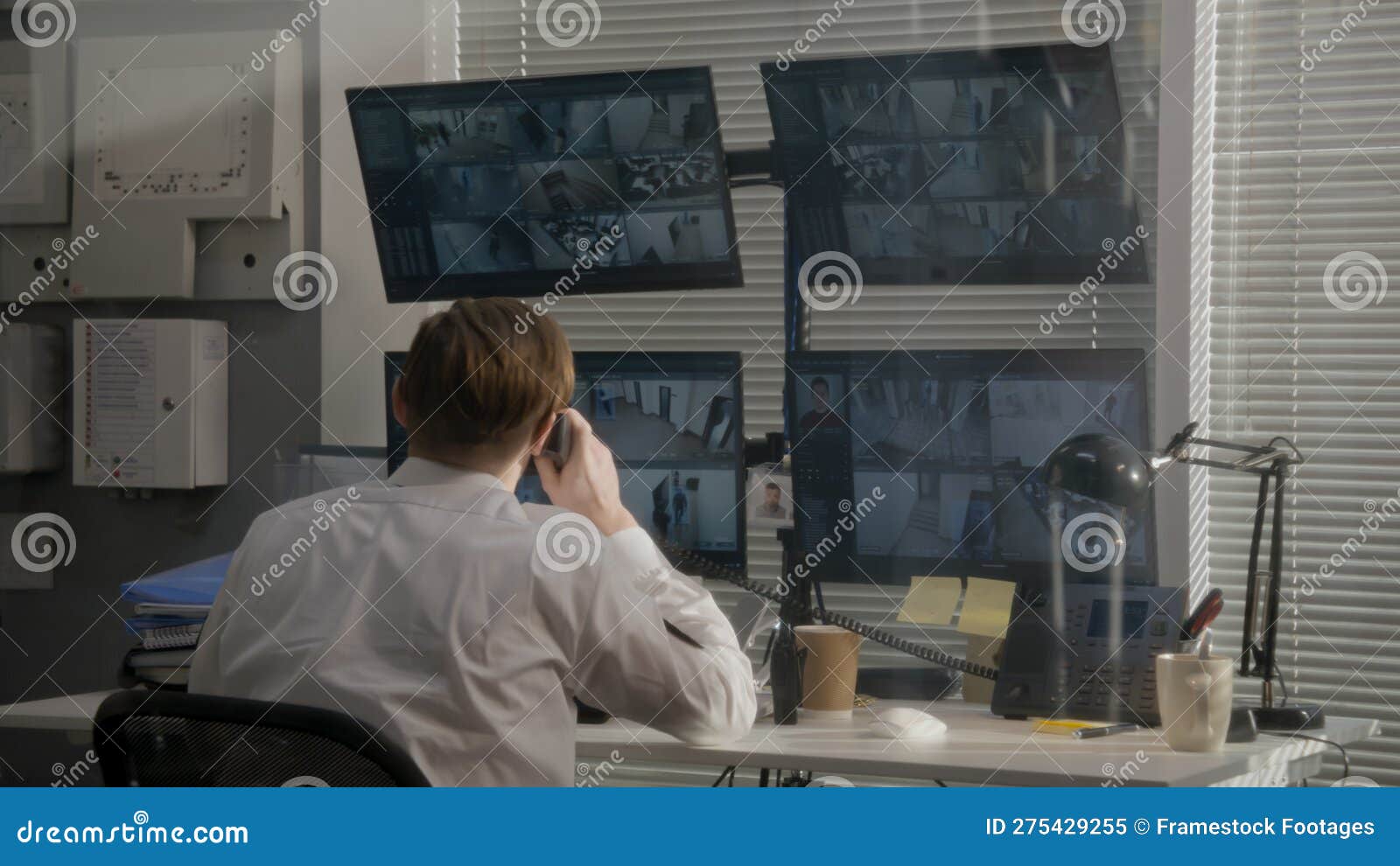 Security Operator Monitors CCTV Cameras on Computers Stock Image ...