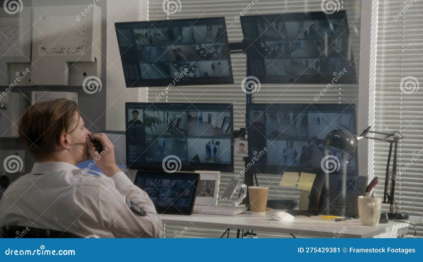 Security Operator Monitors CCTV Cameras on Computers Stock Image ...