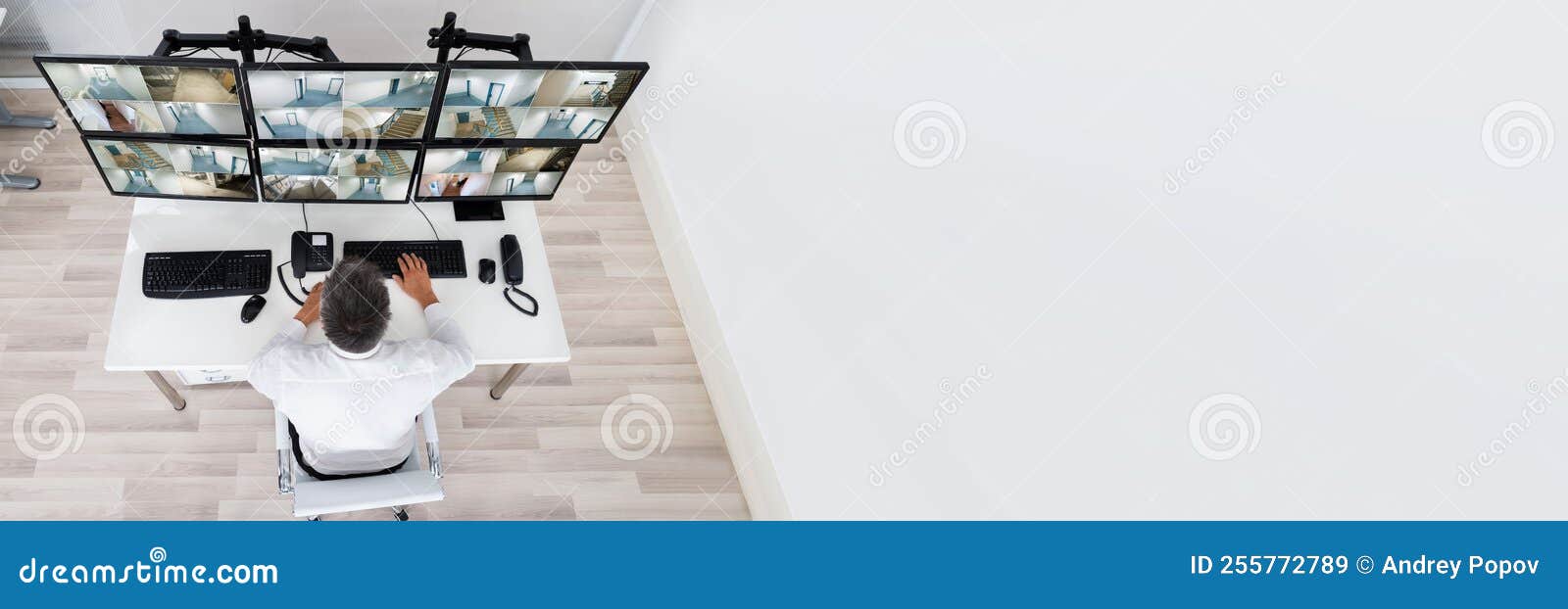 Security System Operator Looking at CCTV Camera Footage Stock Image ...