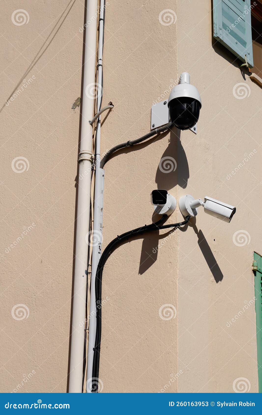 Security Three Cctv and Round Camera on Facade Wall Building Stock ...
