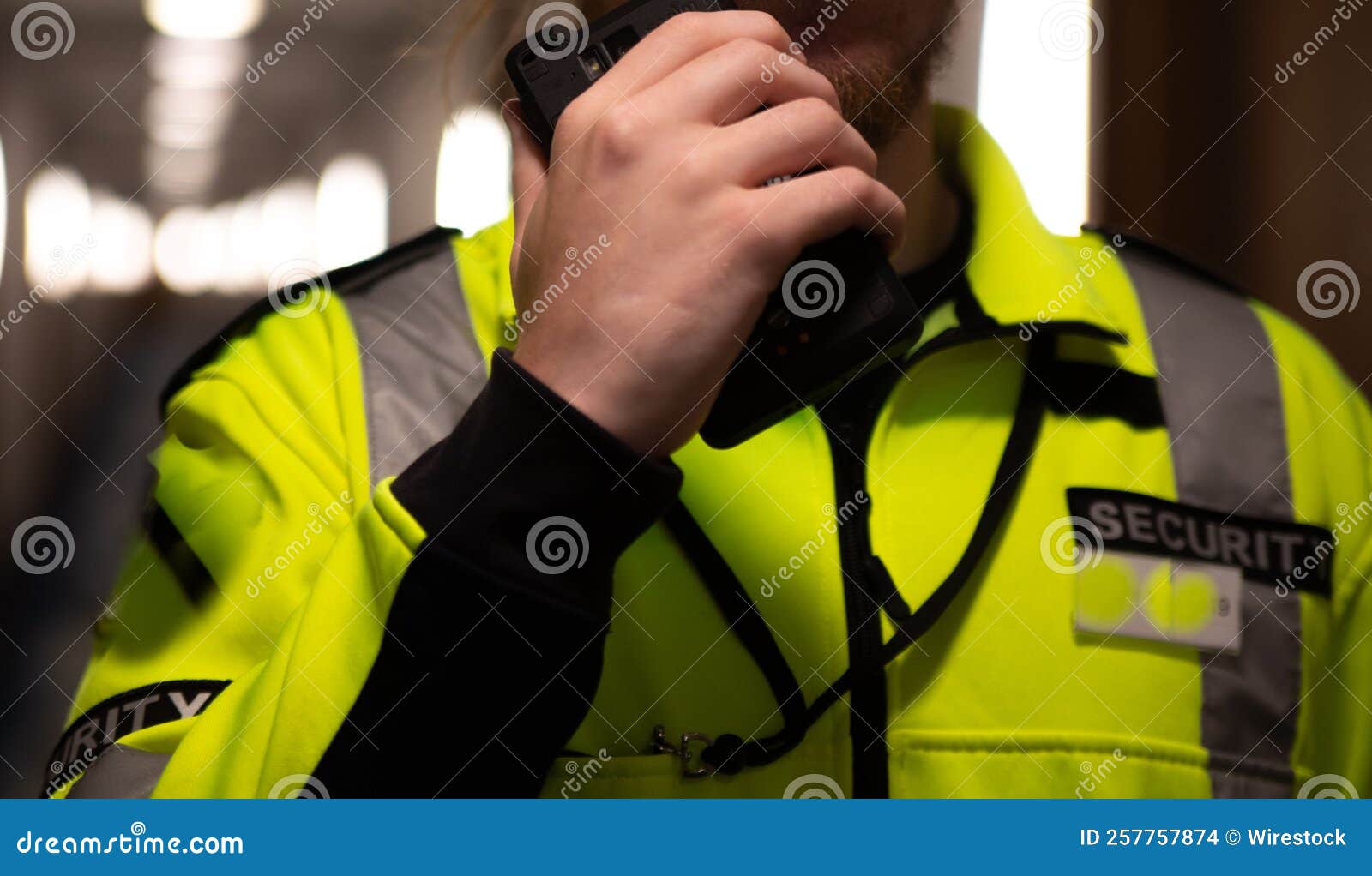 Security Worker Talking on a Walkie-talkie Stock Photo - Image of ...
