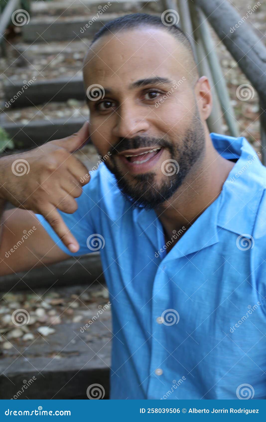 Seductive Man Requesting a Call with Hand Gesture Stock Photo - Image ...