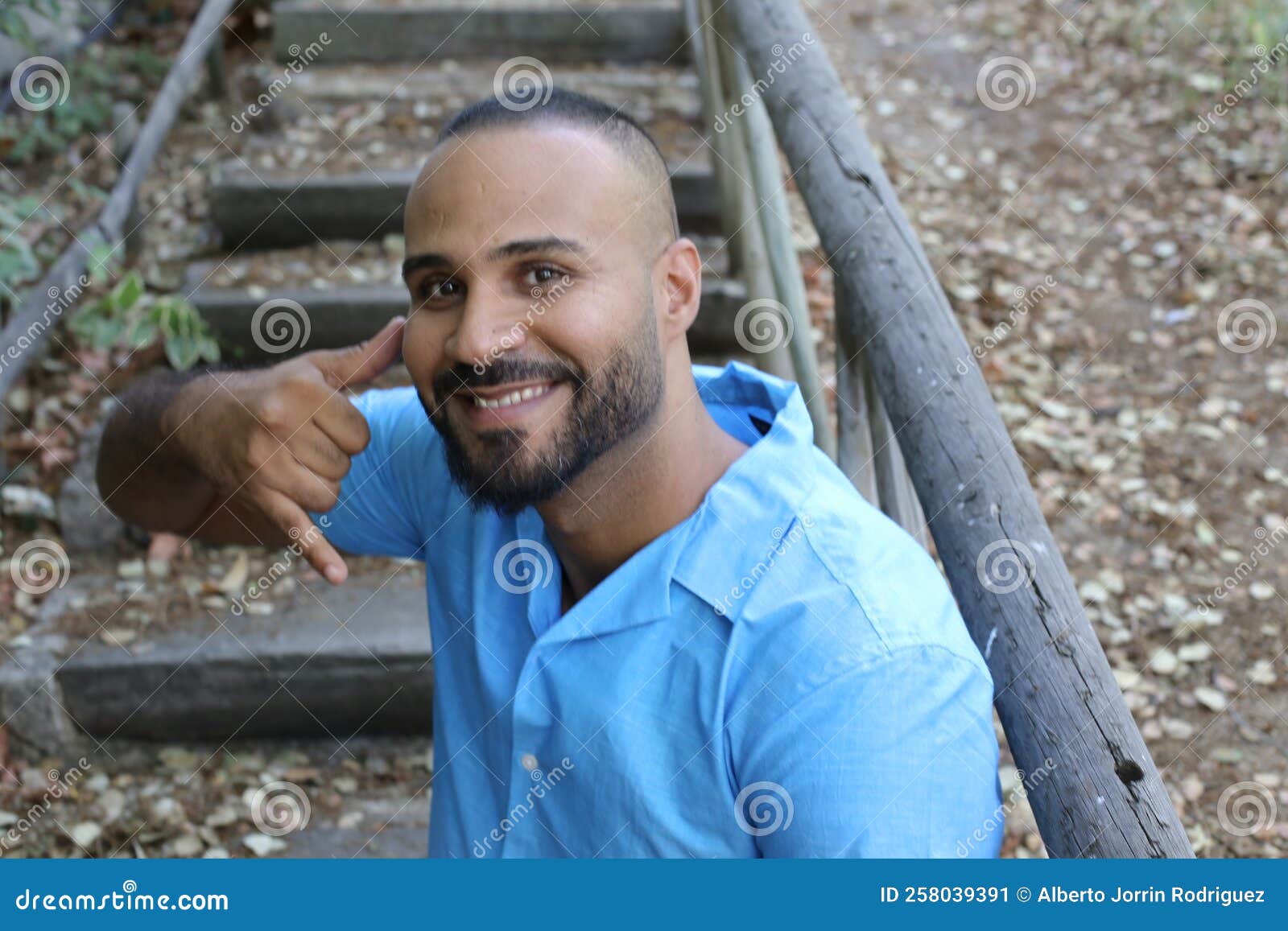 Seductive Man Requesting a Call with Hand Gesture Stock Image - Image ...