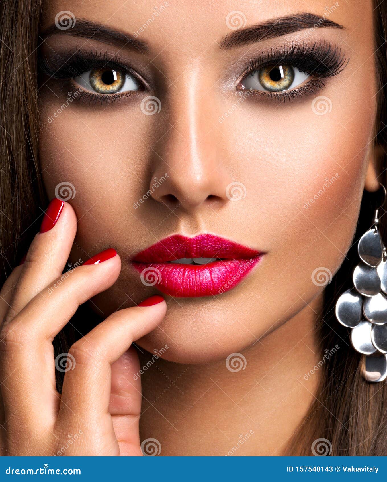Seductive Woman With Dark Brown Eye Makeup And Bright Red Lips And