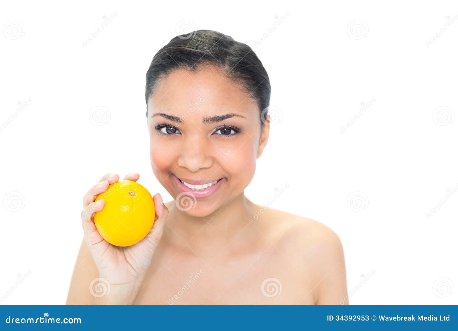 Seductive Young Dark Haired Model Holding An Orange Stock Image Image