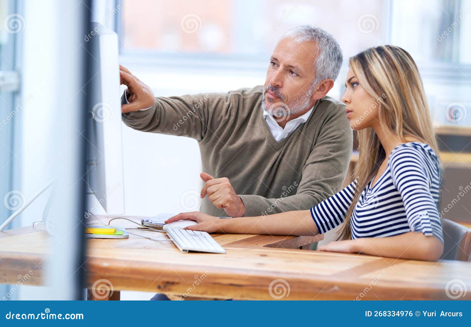 They always See Eye To Eye. a Two Coworkers Having a Discussion at a ...