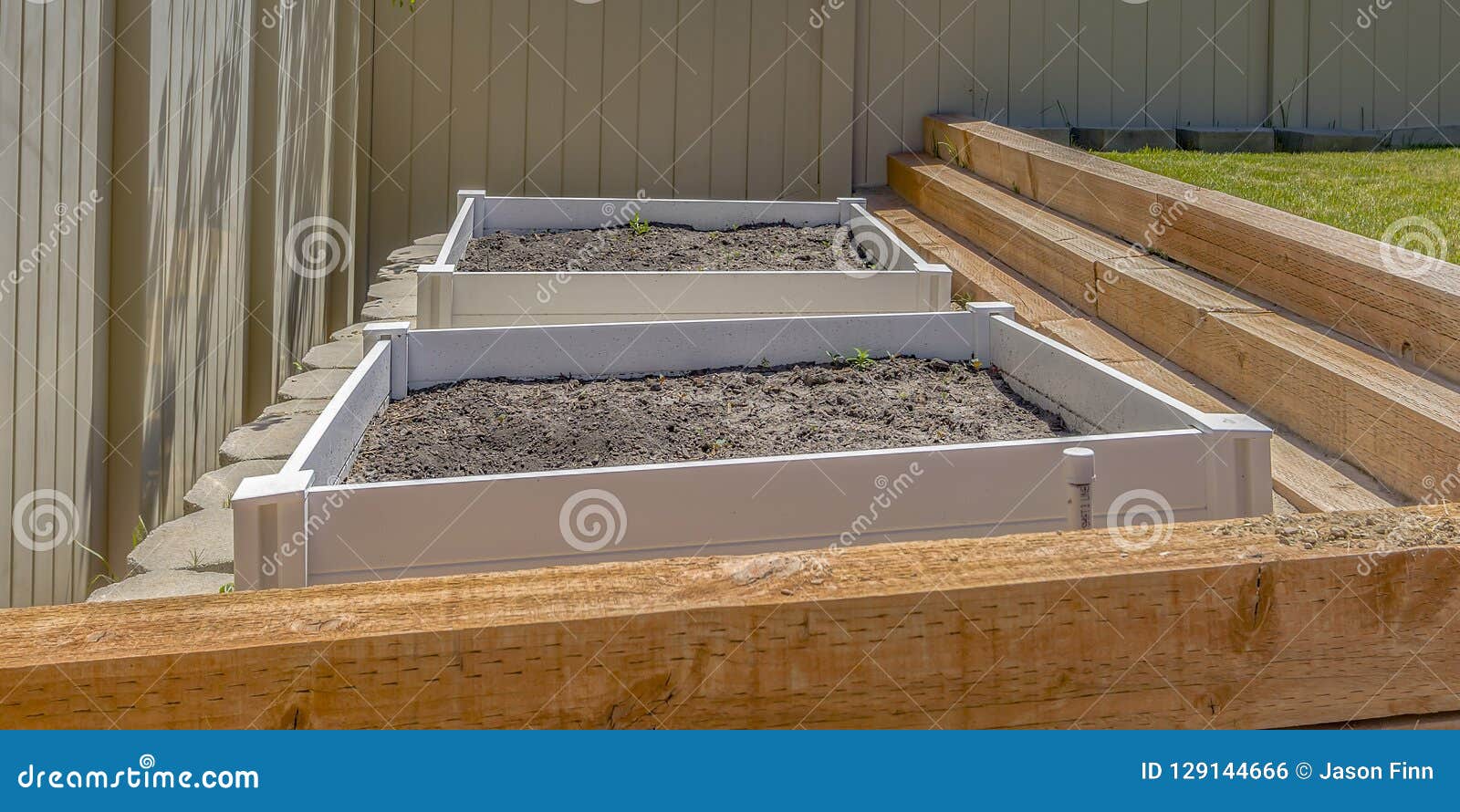 Seed Box Filled with Soil Inside a Sunny Backyard Stock Photo - Image ...