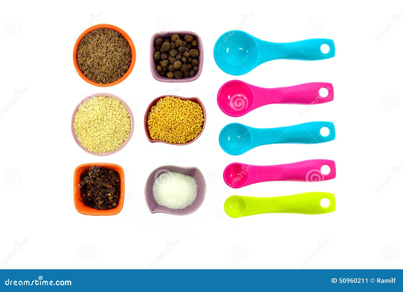 Seeds, Spices, Grains in Small Multi-colored Cups and Measuring Spoons ...