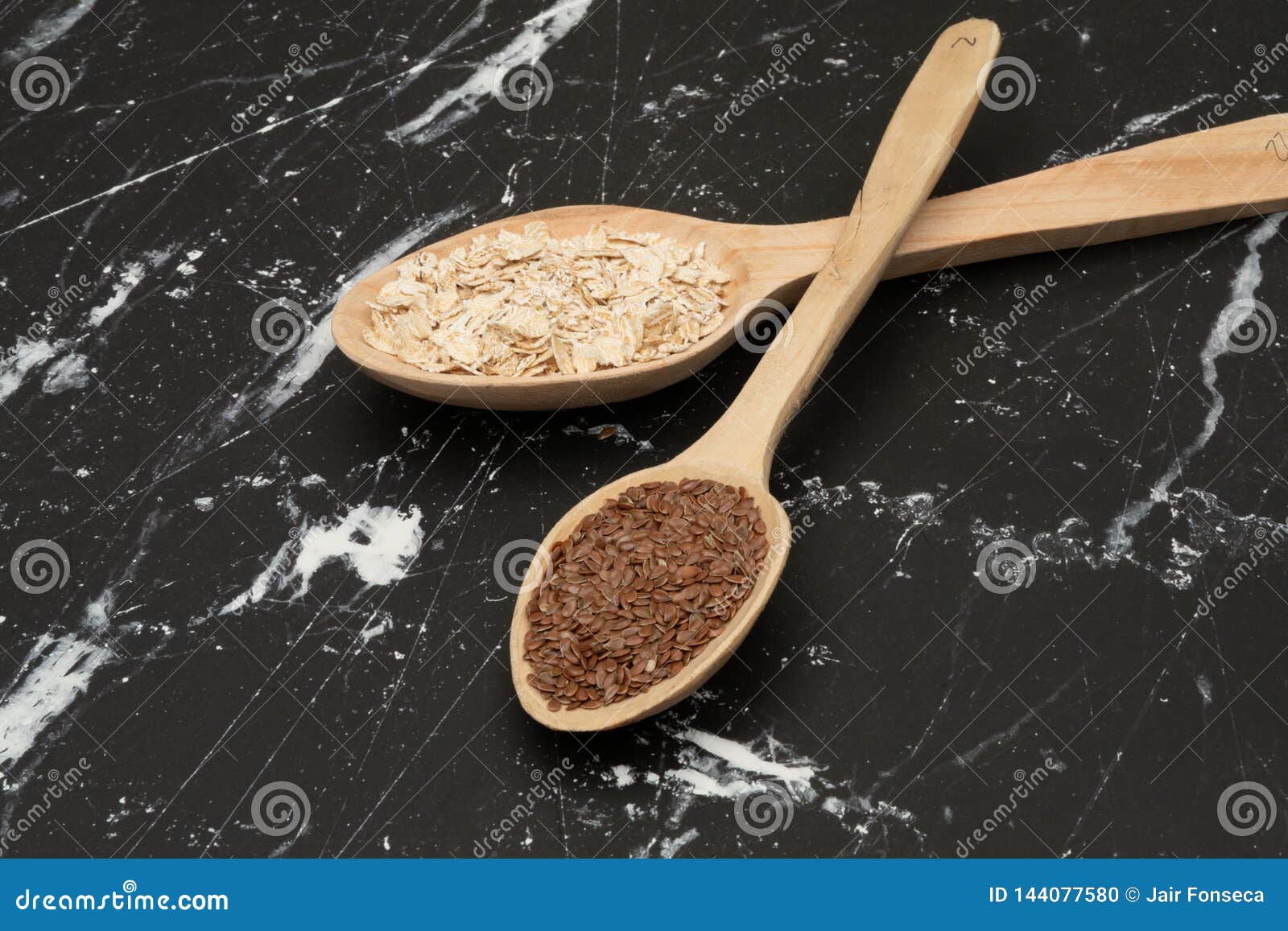 Seeds on a Wooden Spoon Close Up Stock Photo - Image of spice, flavor ...