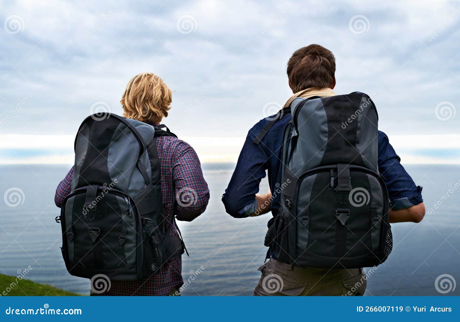 Seeking Out the Best Views. Rear-view of Two Backpackers Admiring a ...