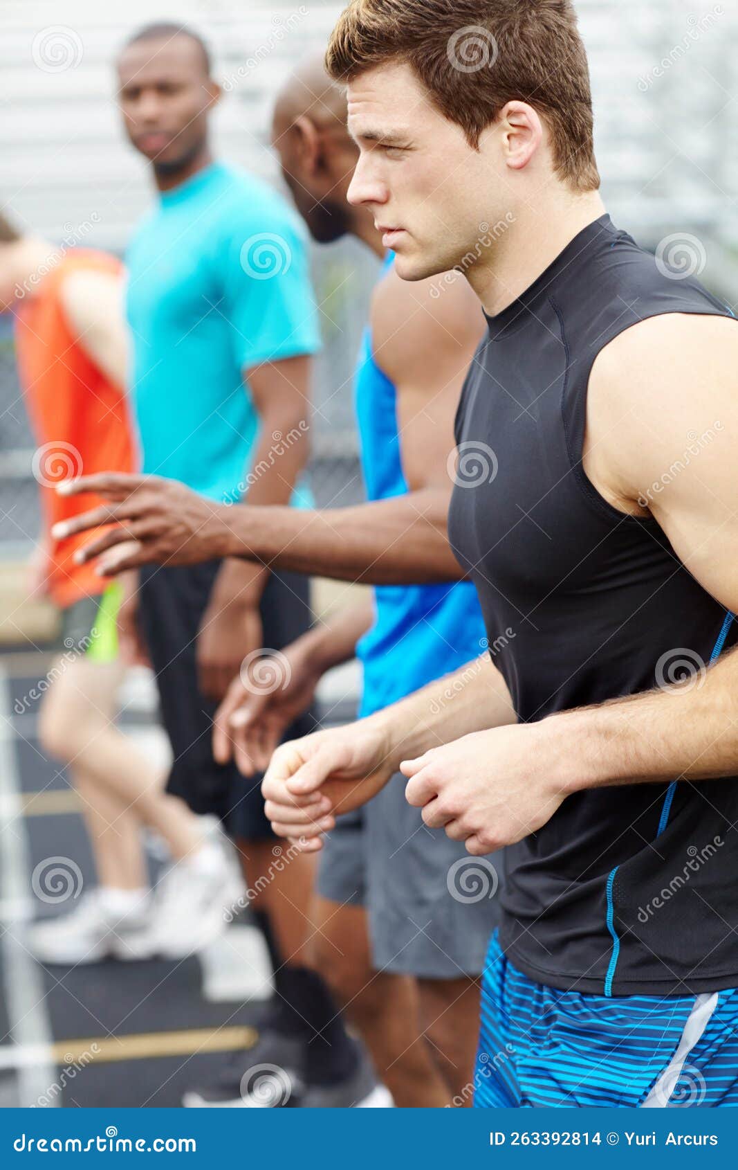 He only Sees the Finish Line. Side View of a Line Up of Runners at the ...